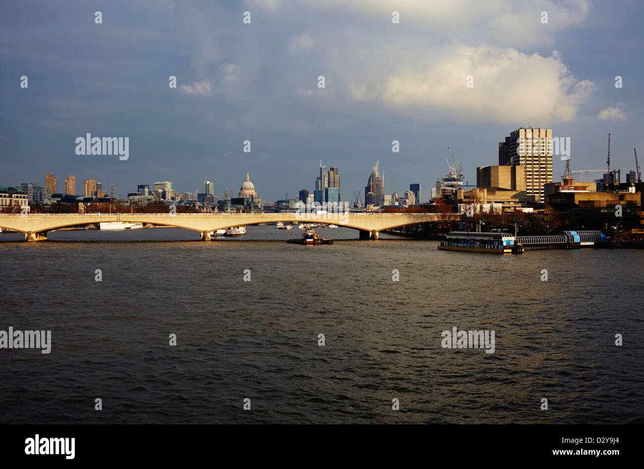 Waterloo bridge and City of London with river Thames in foreground ...