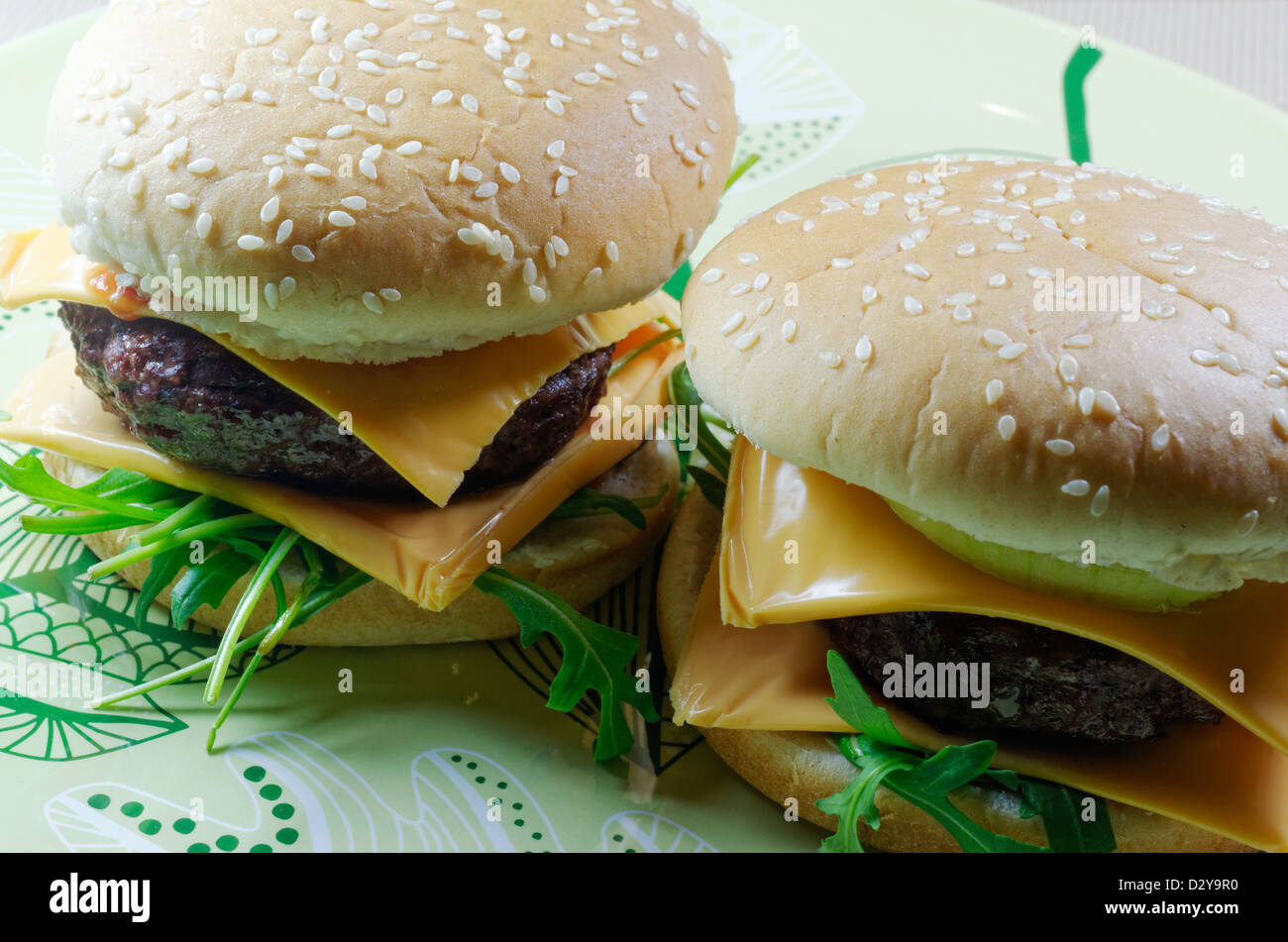 Two homemade hamburgers on a plate Stock Photo - Alamy
