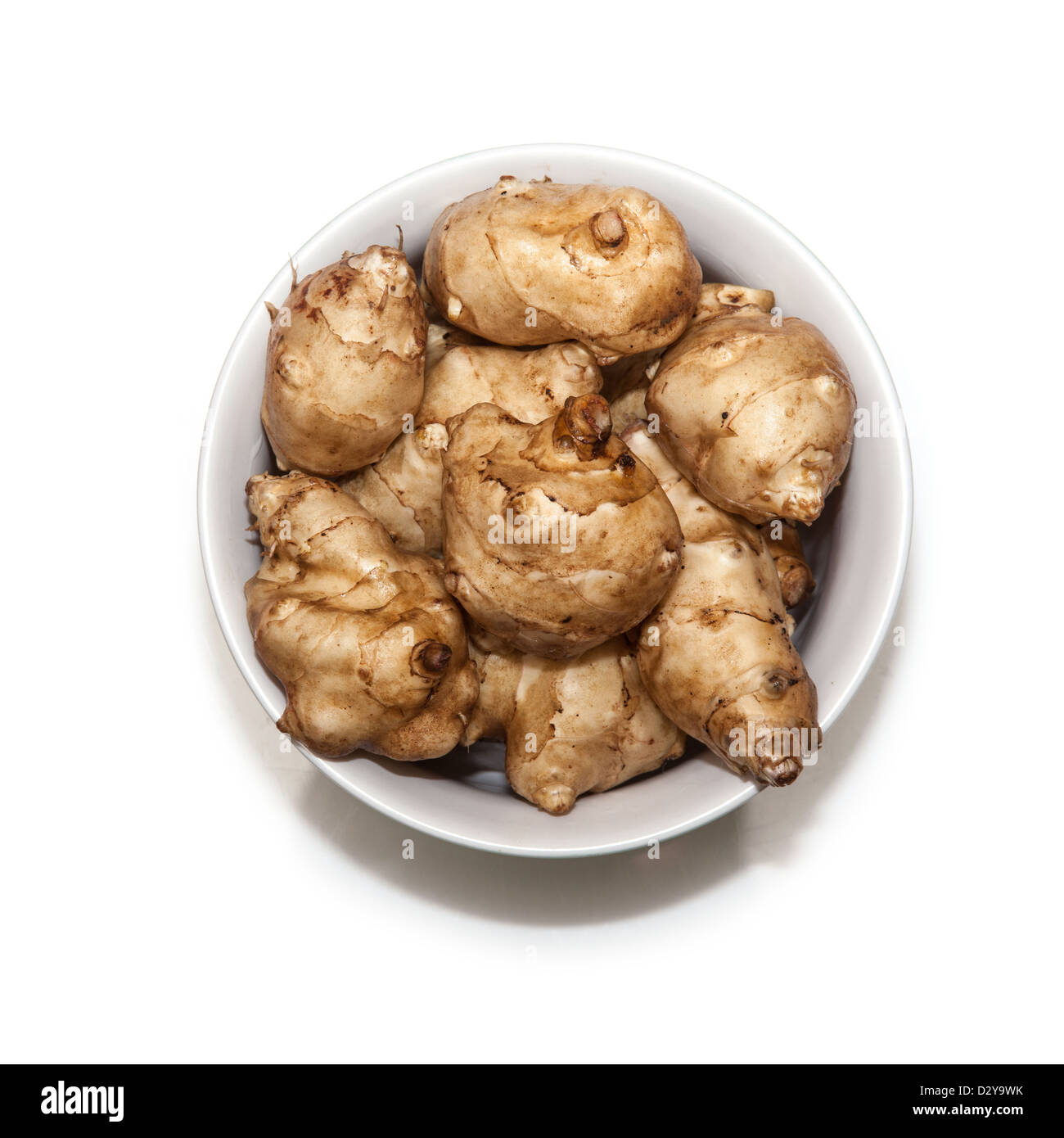 Bowl of Jerusalem Artichoke's (Helianthus tuberosus) vegetable isolated ...