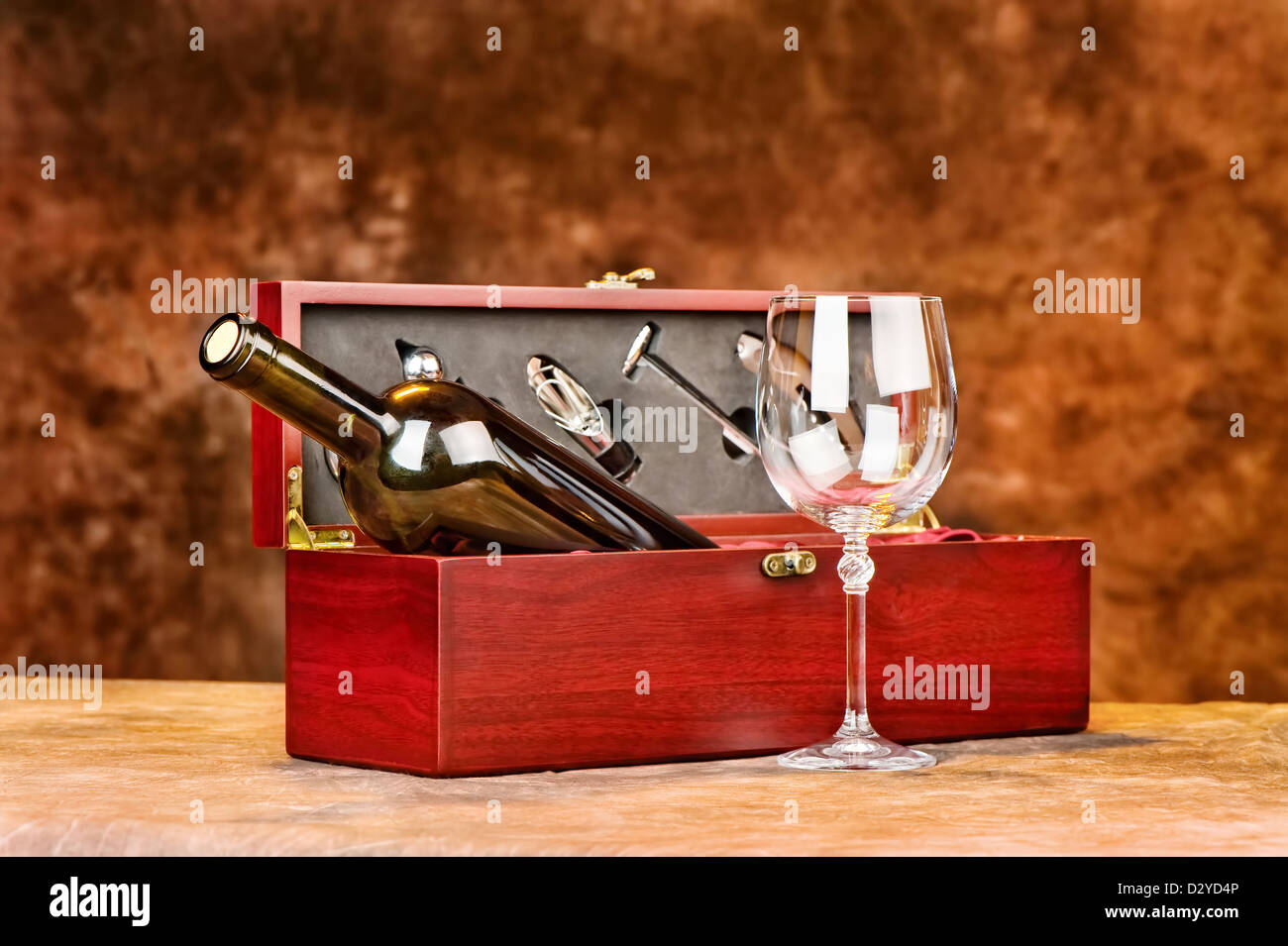 Wine cup in front of vintage wooden wine case Stock Photo - Alamy