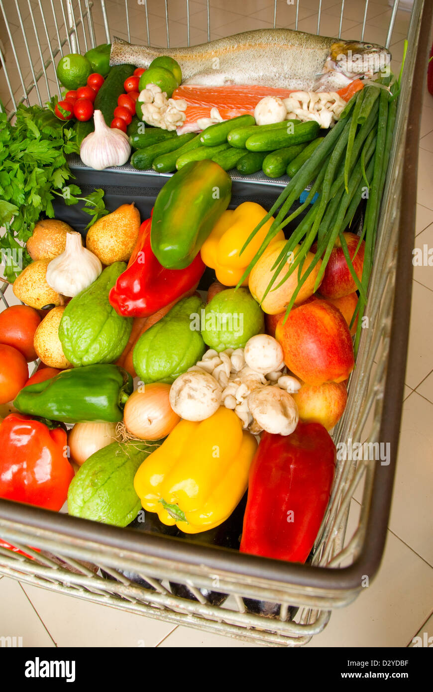 a shopping cart with healthy food Stock Photo - Alamy