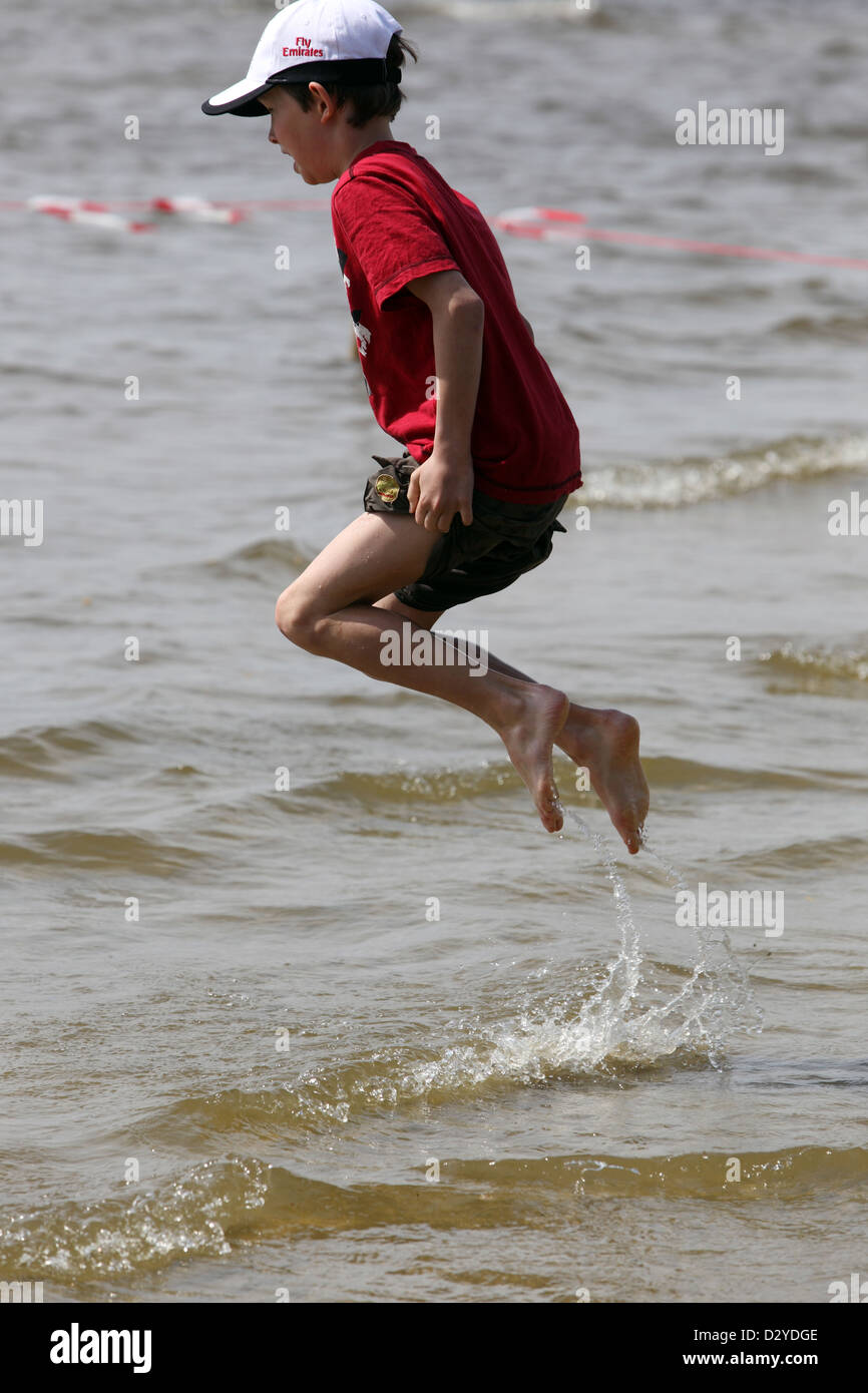 Berlin, Germany, boy jumping around in the water Stock Photo - Alamy