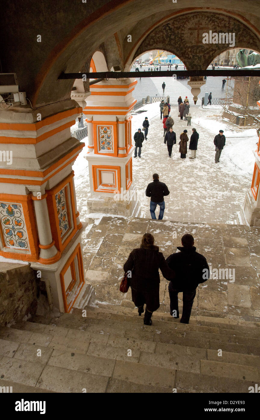 Visitors walking down exit steps from St Basil's Cathedral, Red Square ...