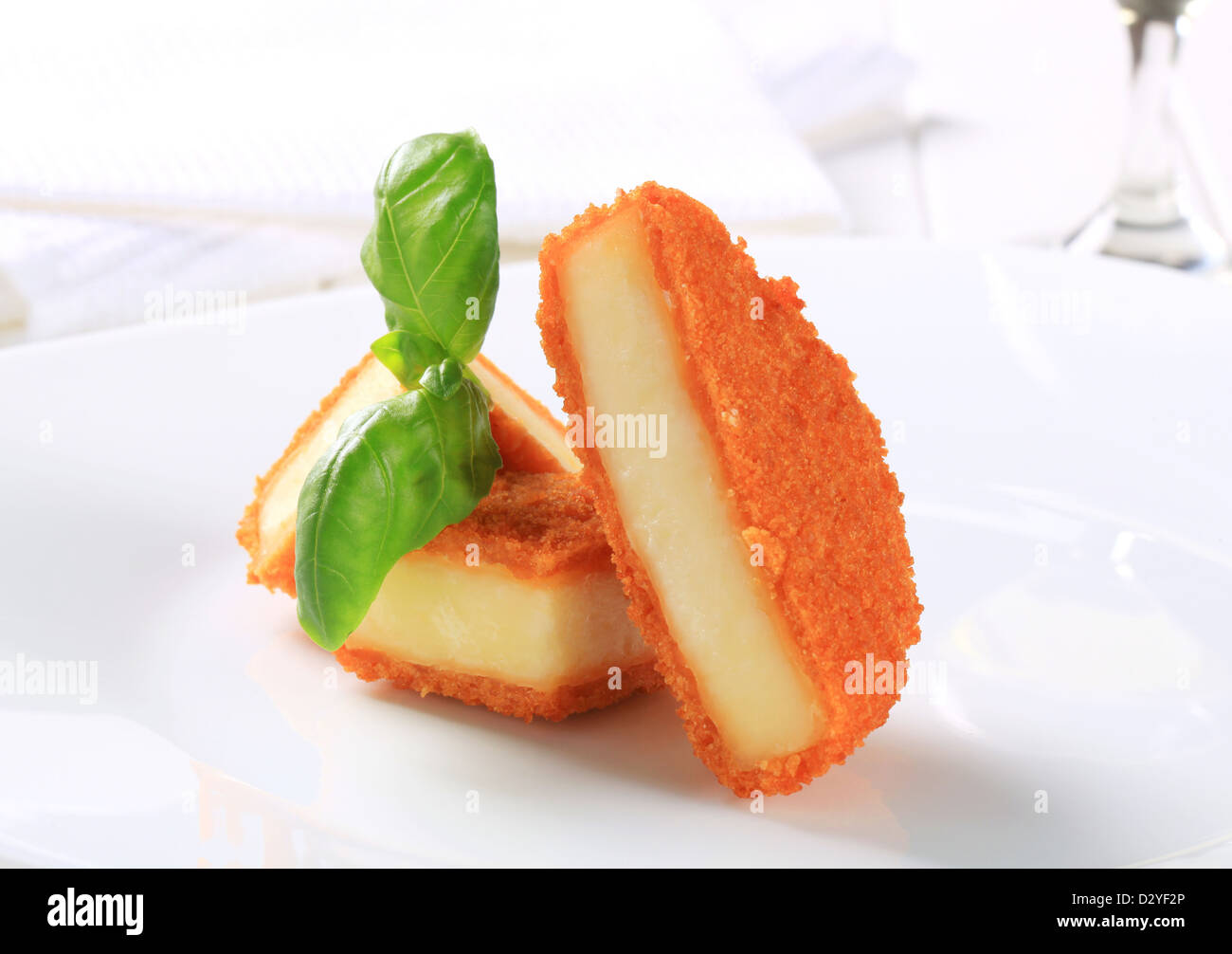 Pieces of deep fried breaded cheese Stock Photo - Alamy