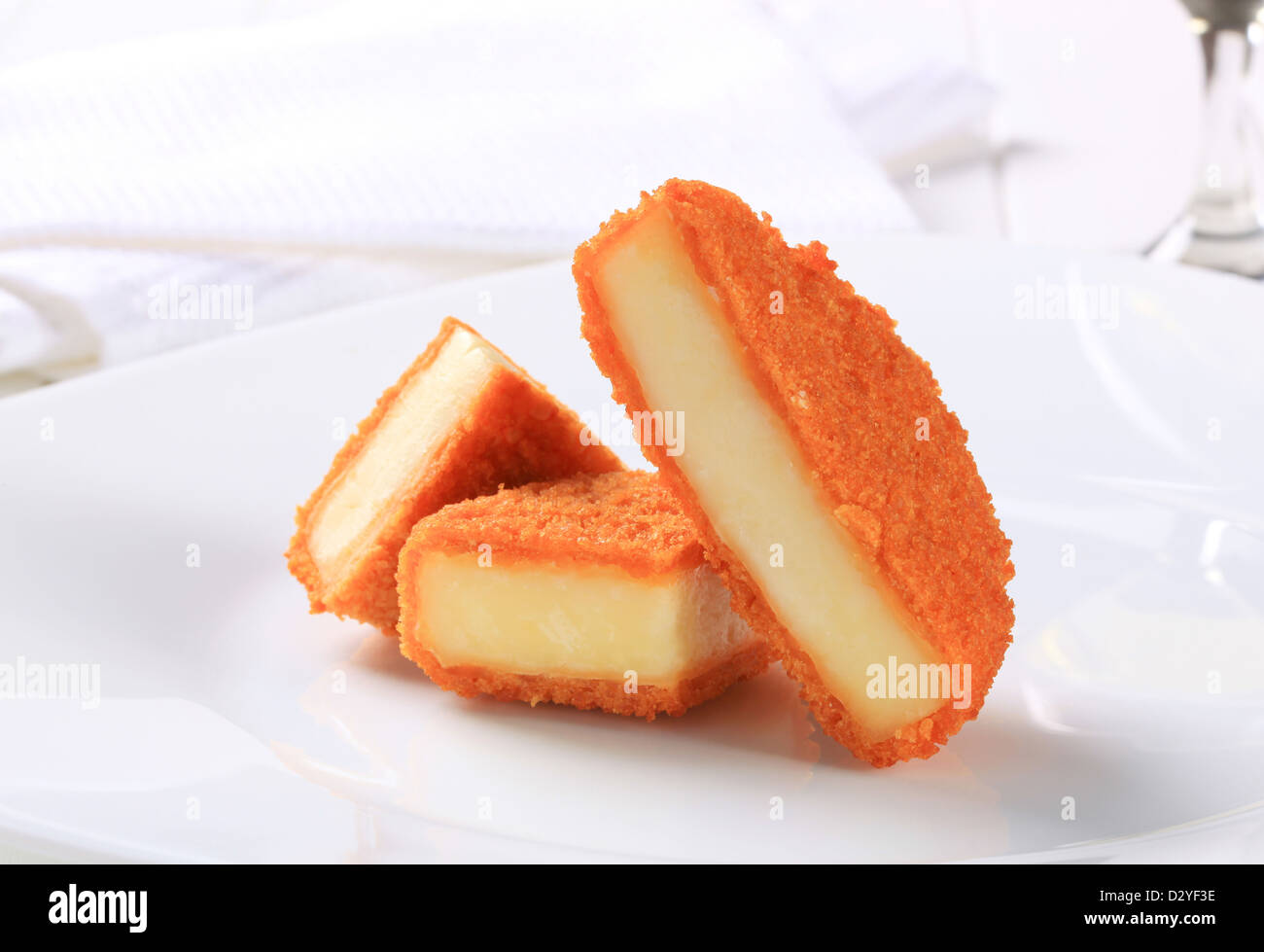 Pieces of deep fried cheese Stock Photo - Alamy