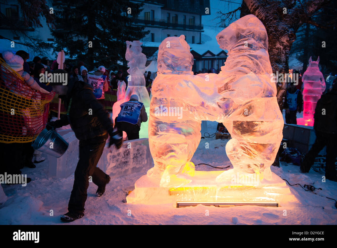 Visitors admire beautiful ice sculptures at the Tatry Ice Master 2013 ...