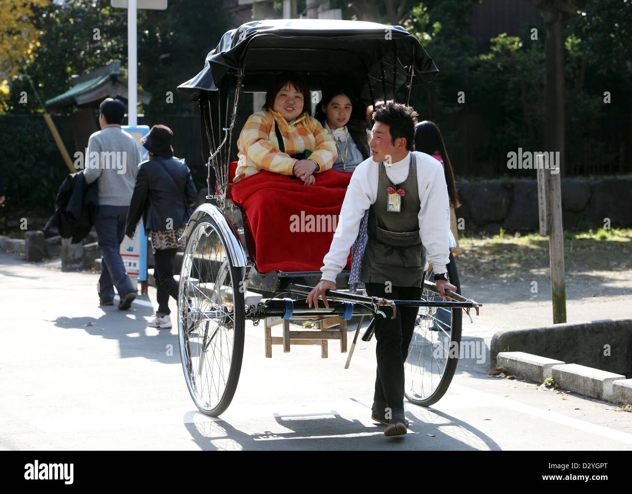 Kamakura, Japan, women are sitting in a rickshaw Stock Photo - Alamy
