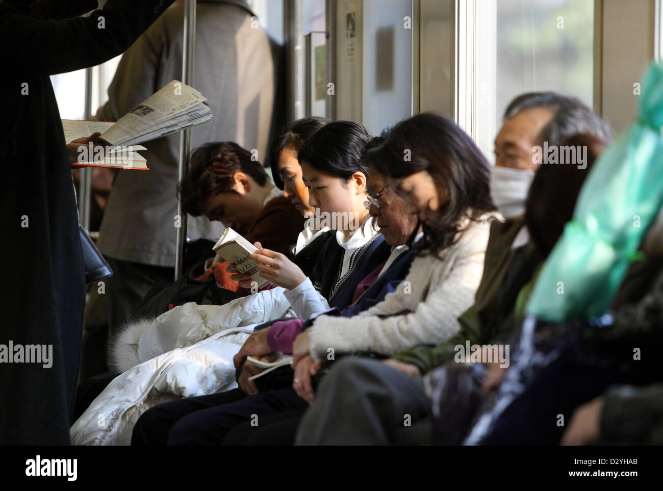 Kamakura, Japan, people are sitting in a train compartment Stock Photo ...