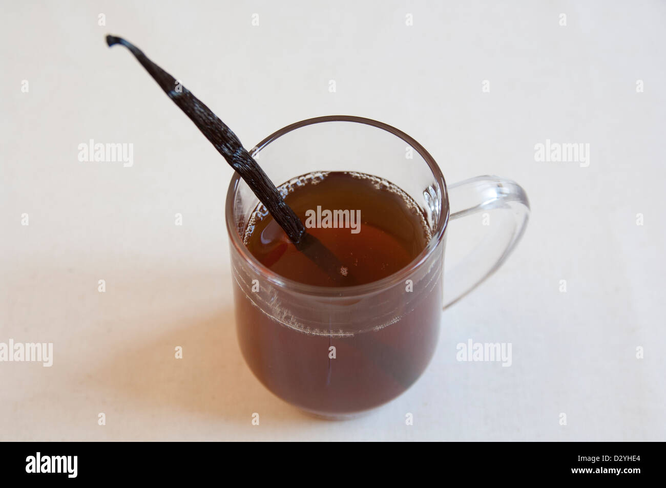 Close-up view of organic Vanilla Infusion in a cup with a Vanilla stick ...