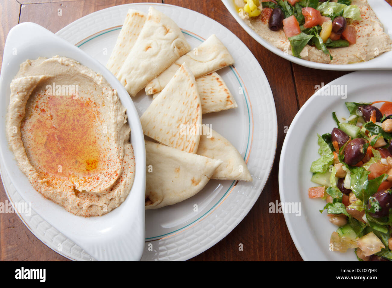 Varied Middle Eastern, Mediterranean style appetizers including hummus ...