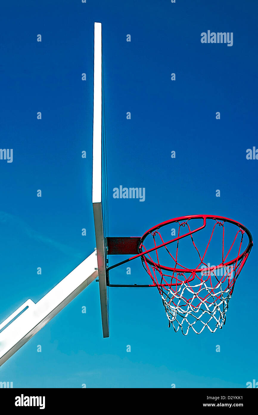 Panel basketball hoop under a blue sky Stock Photo - Alamy