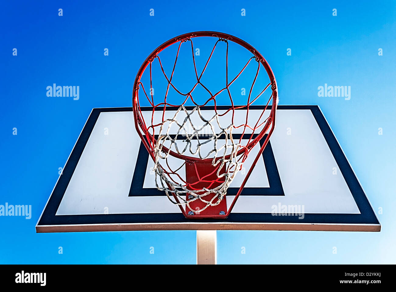 Panel basketball hoop under a blue sky Stock Photo - Alamy