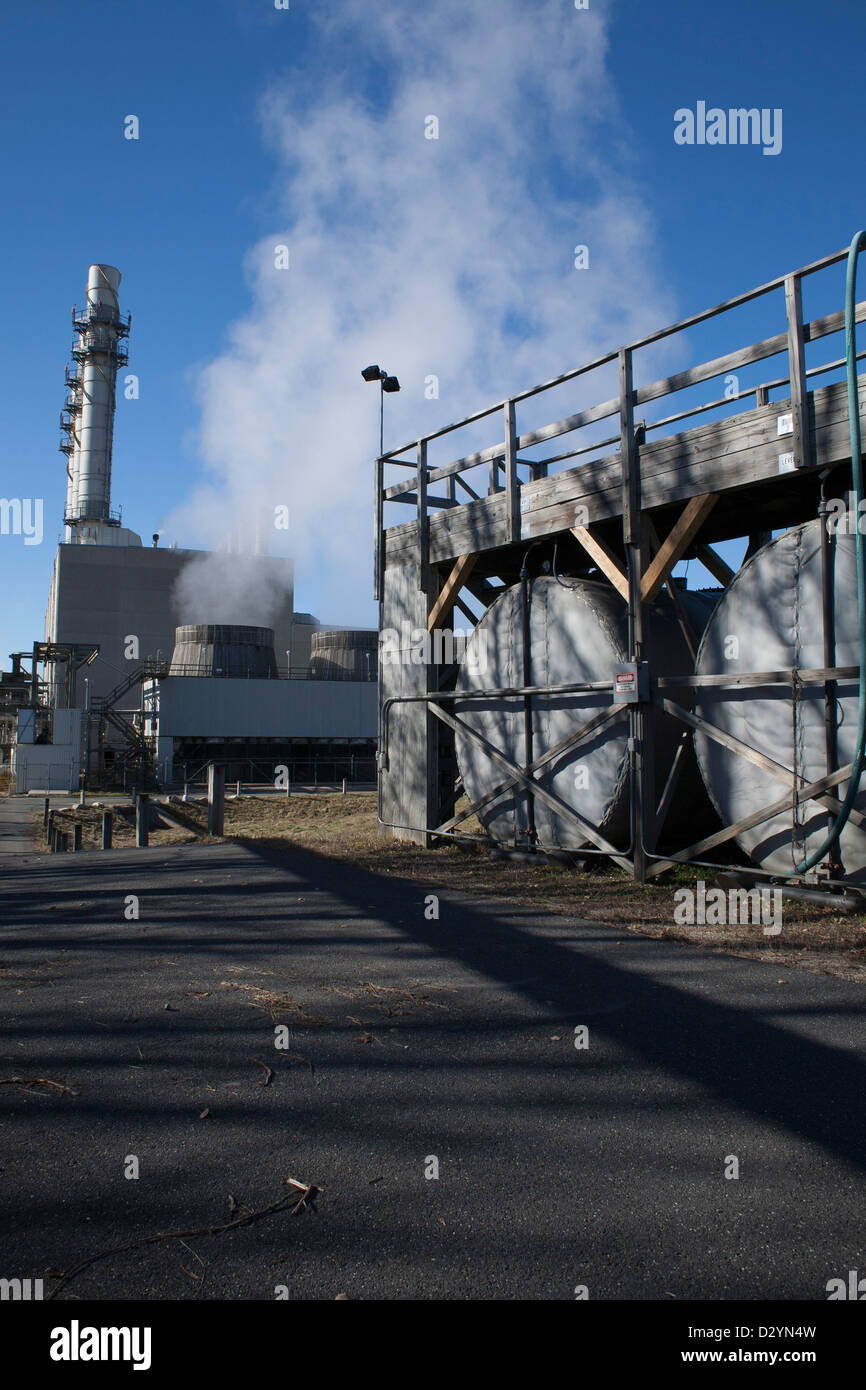 Steam rises from cooling tanks at a General Electric plant in ...