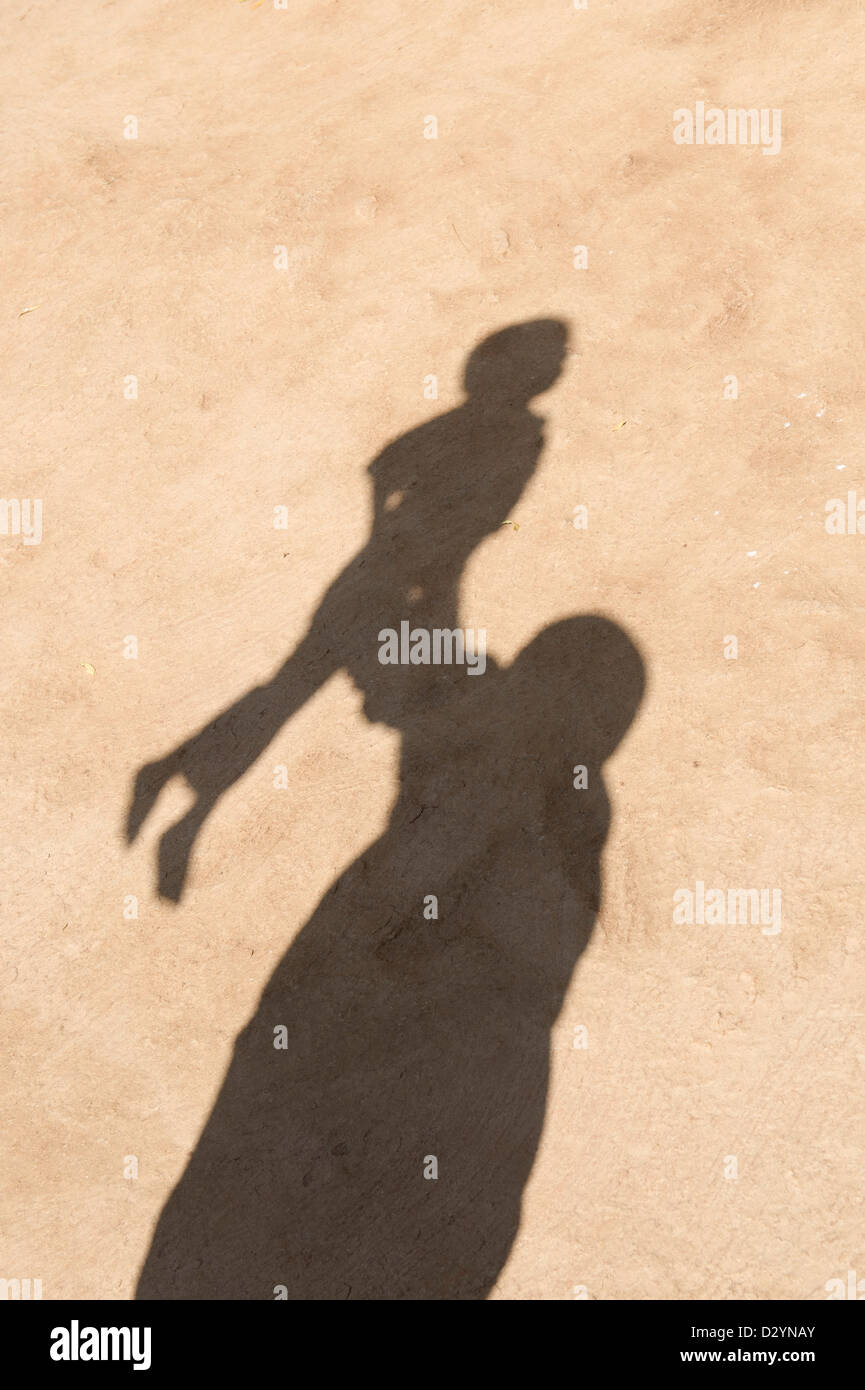 Father playing with son shadow. India Stock Photo - Alamy