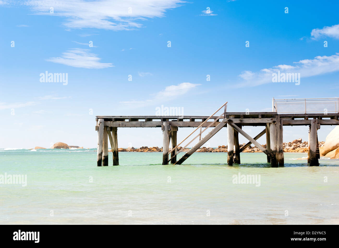 Jetty stretches out into the clear blue water in South Australia Stock ...