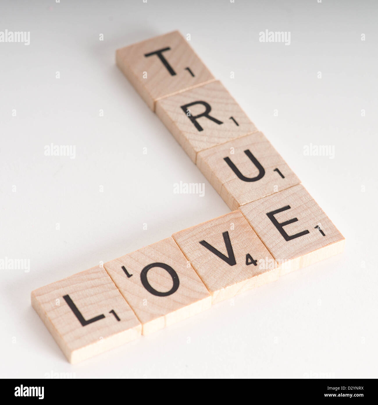 True Love Concept. Wooden Scrabble letters spelling out phrase "True ...