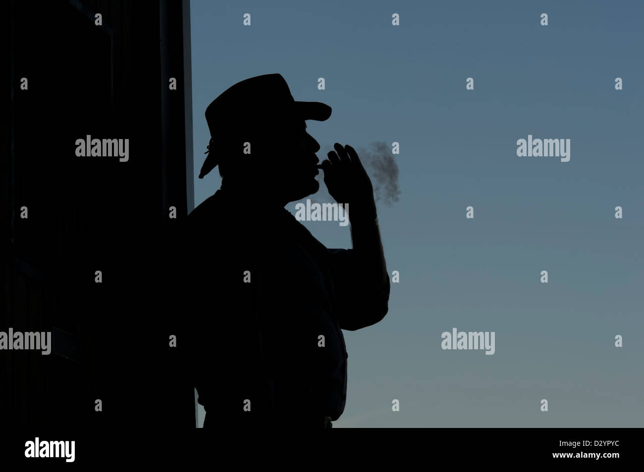 Cowboy smoking cigar hi-res stock photography and images - Alamy
