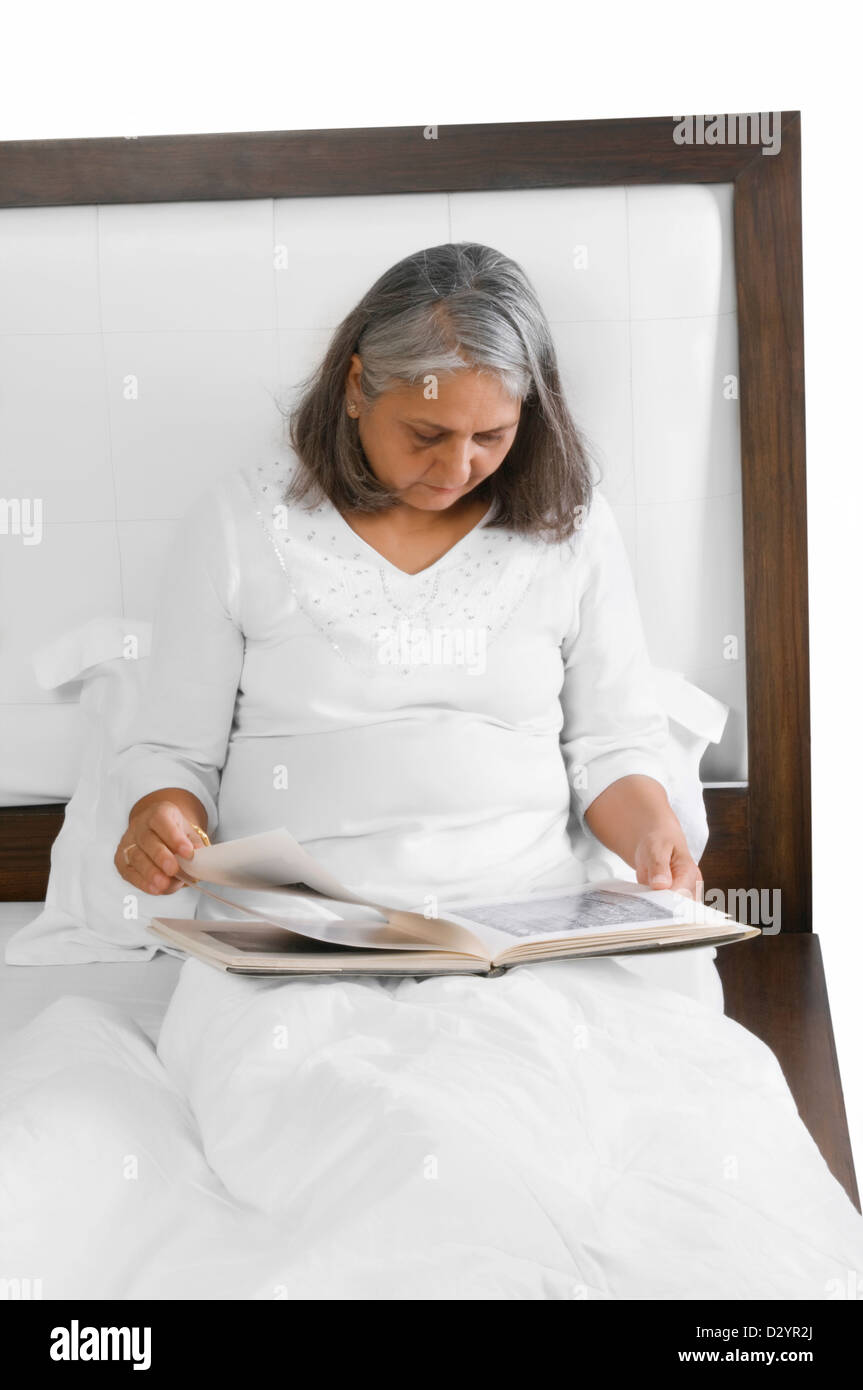 One woman flipping pages book hi-res stock photography and images - Alamy