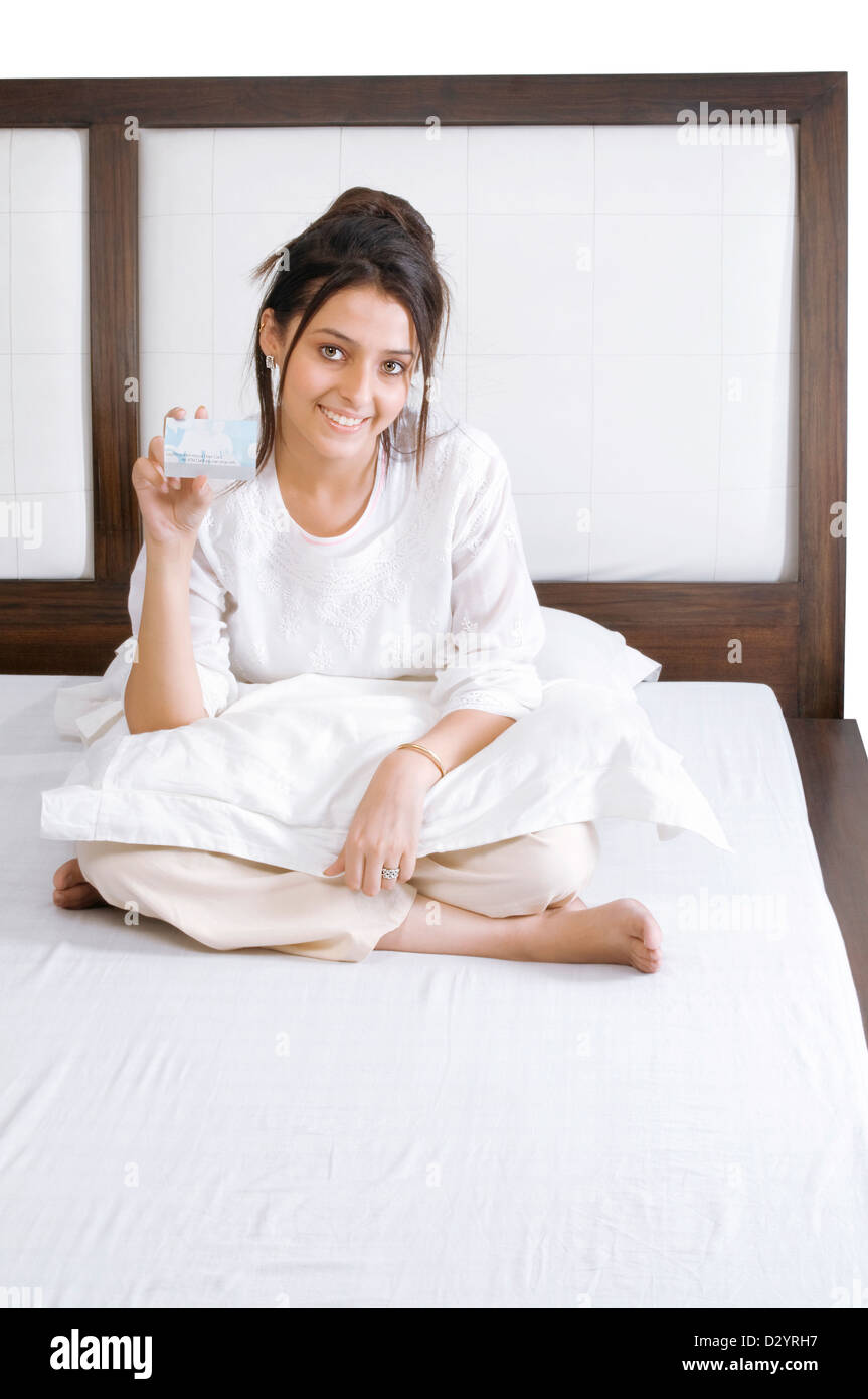 lady sitting on the bed Stock Photo - Alamy