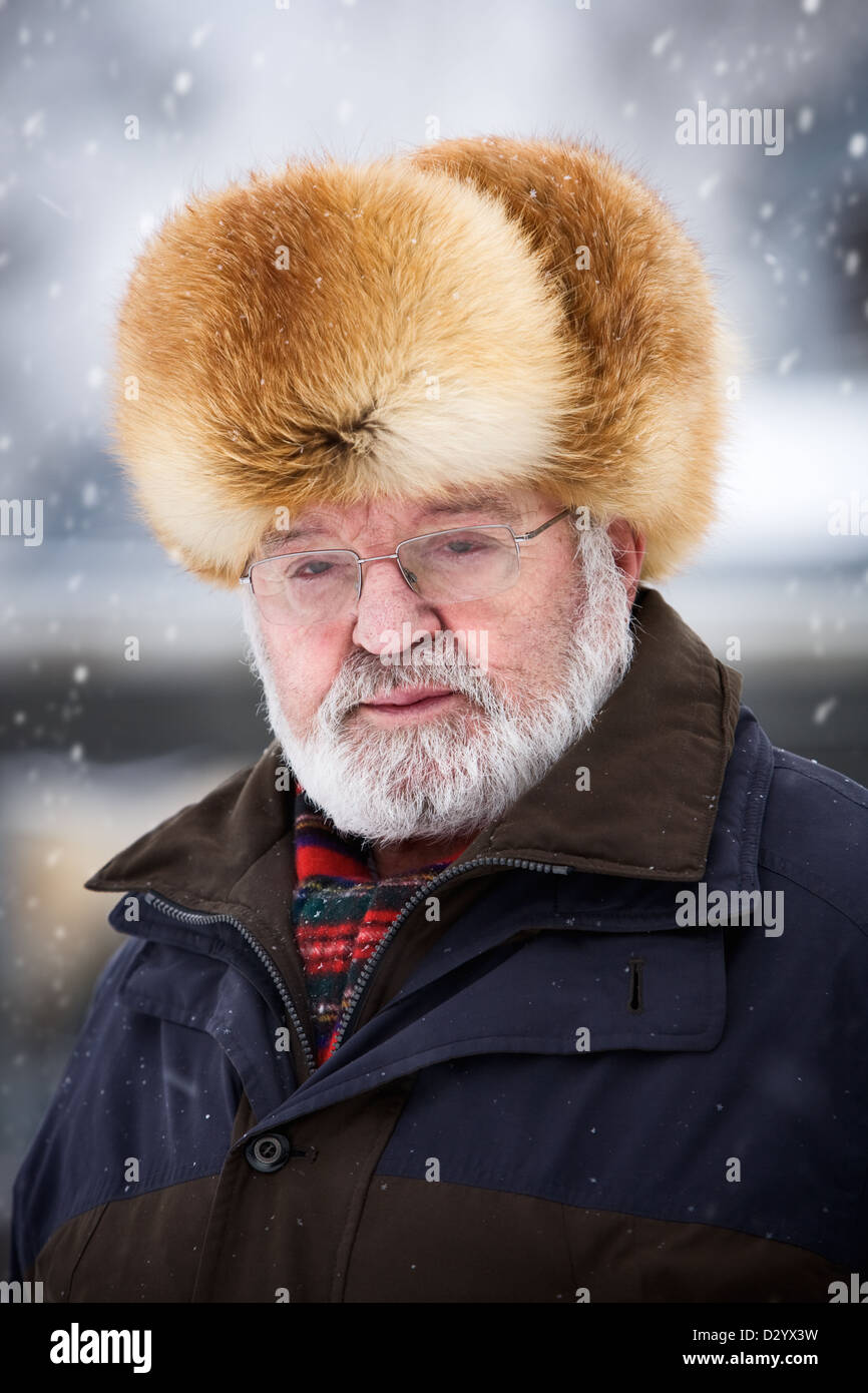 Portrait of senior man wearing fur hat in cold winter Stock Photo - Alamy