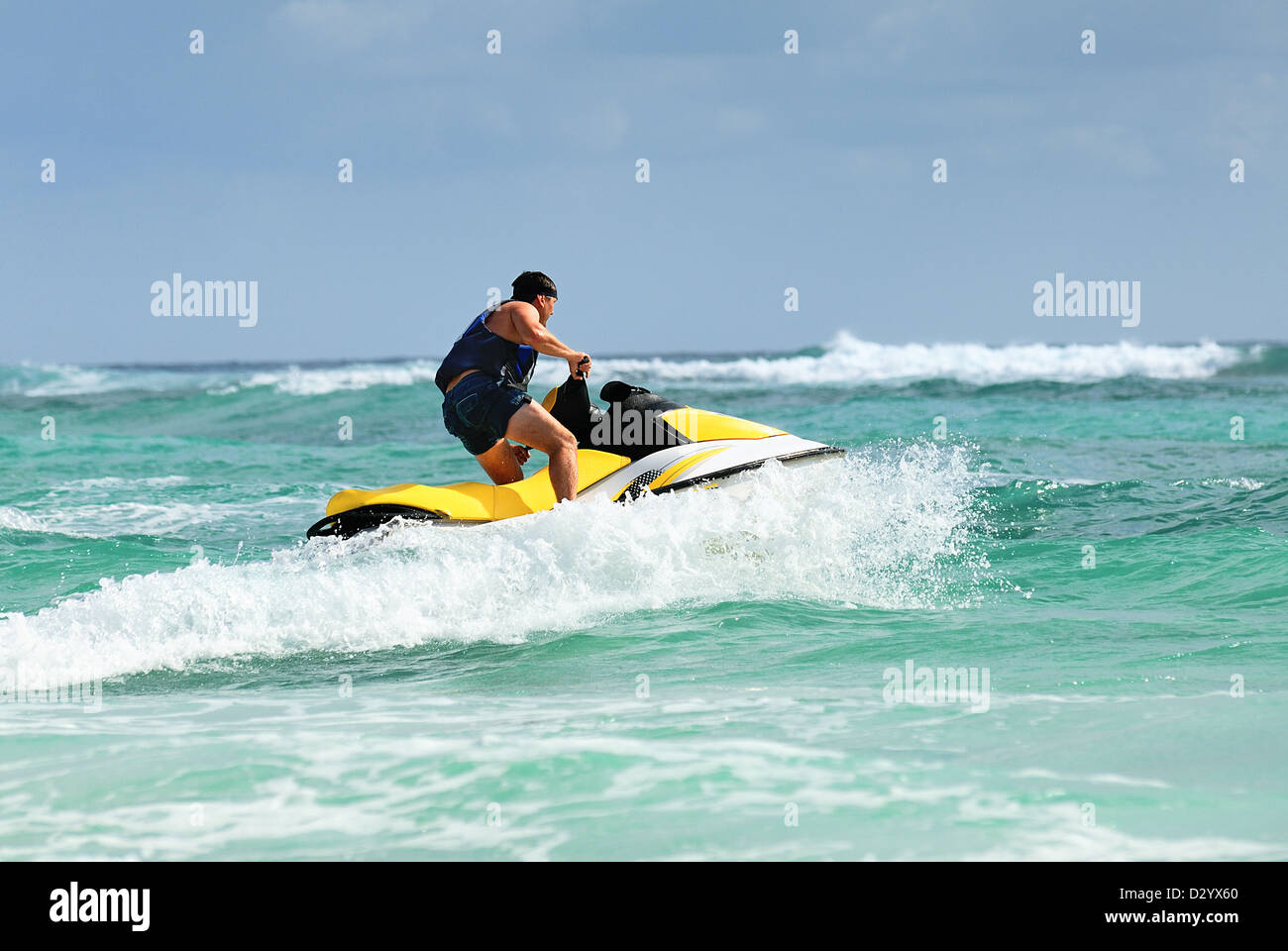 Man on Wave Runner turns fast on the water Stock Photo - Alamy