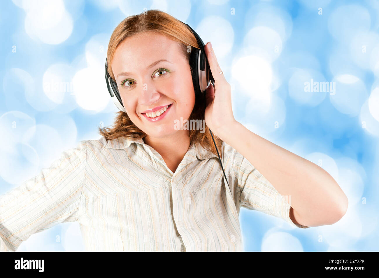 Beautiful woman listening music Stock Photo - Alamy
