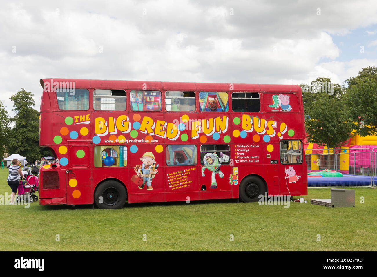 A mobile childen's play facility, The Big Red Fun Bus parked in ...