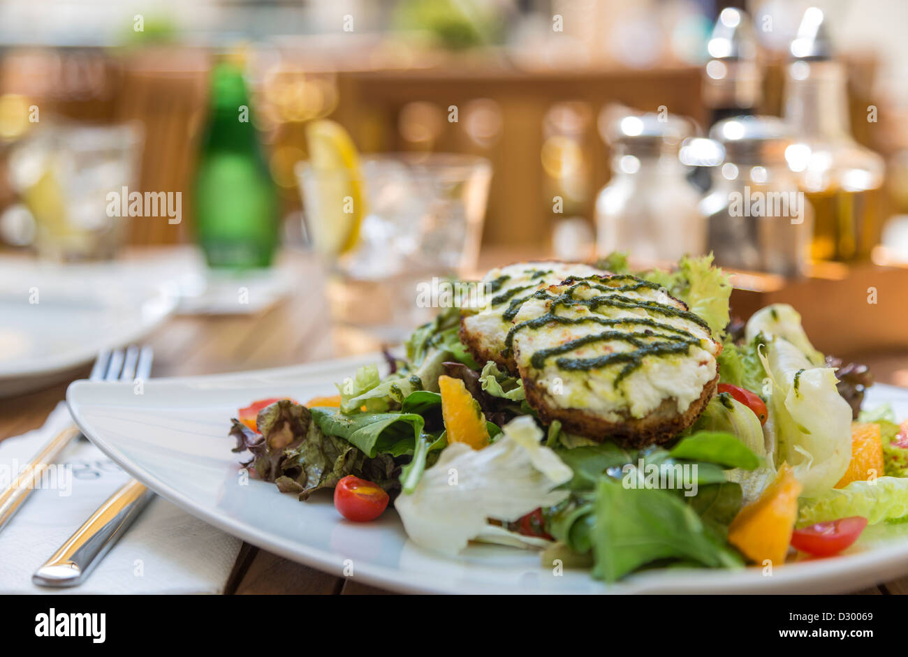 A salad on a table/café set up Stock Photo - Alamy
