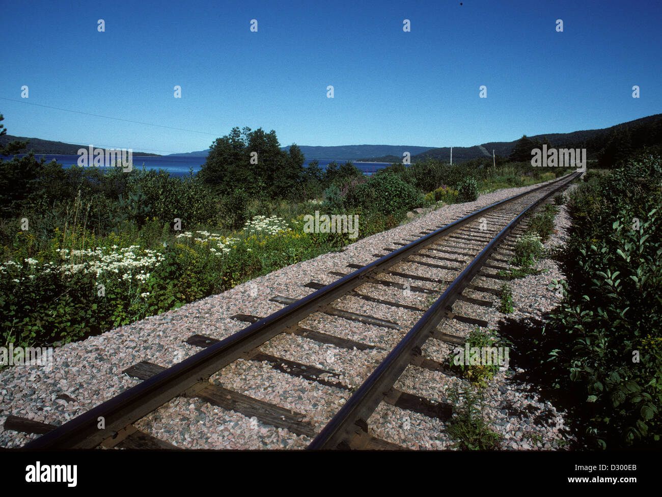 Railway tracks beside lake, Quebec, Canada Stock Photo - Alamy
