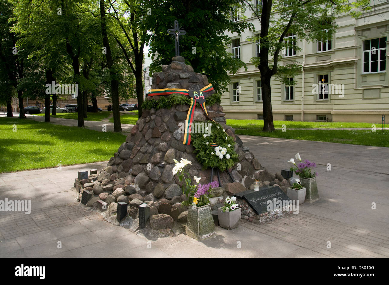 A wreath is placed on the stone memorial for Lithuanian victims on ...