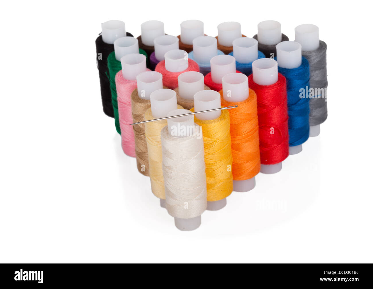 Needle and color threads on isolated on white background Stock Photo ...