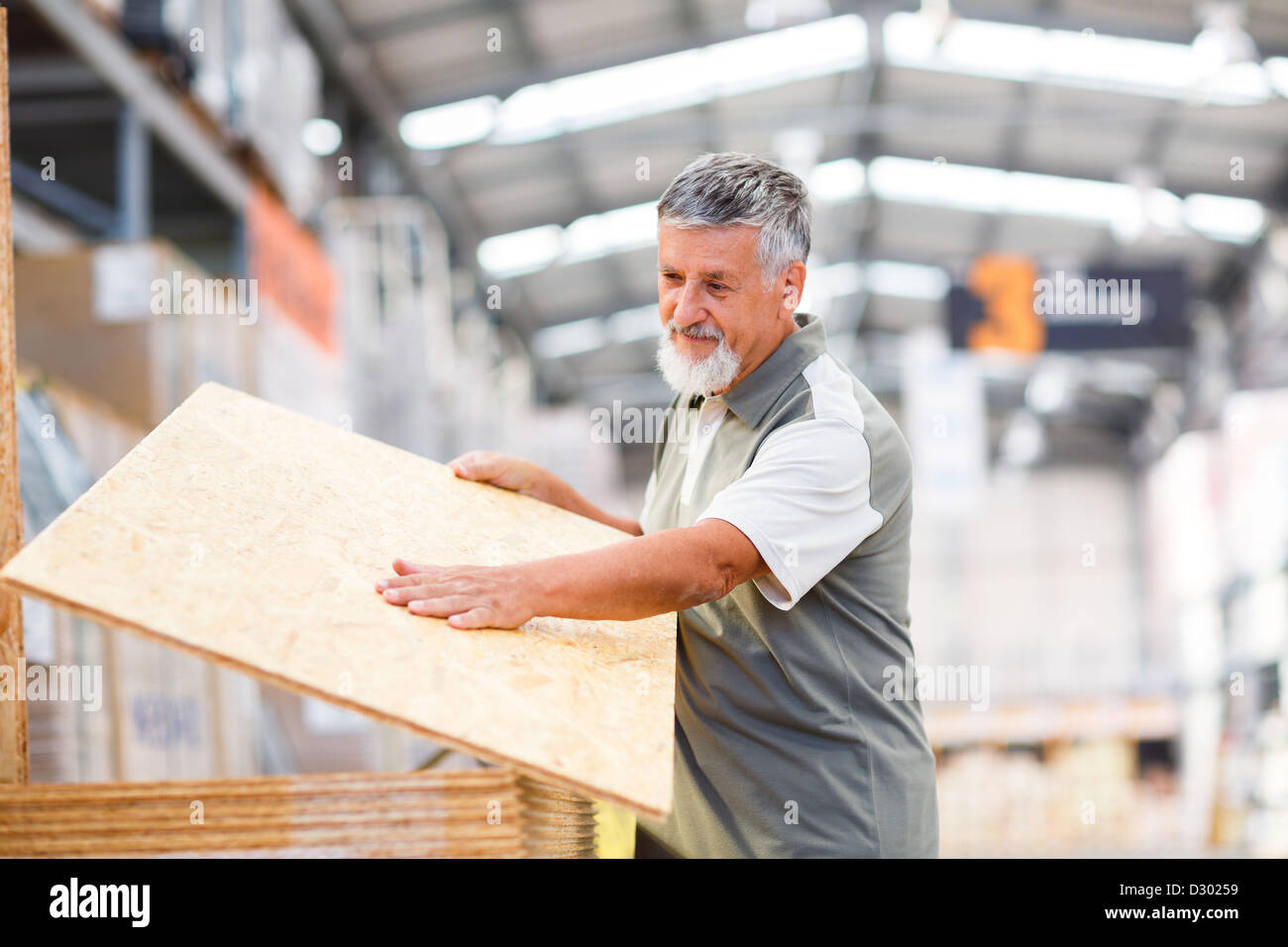 Man buying construction wood in a DIY store Stock Photo - Alamy