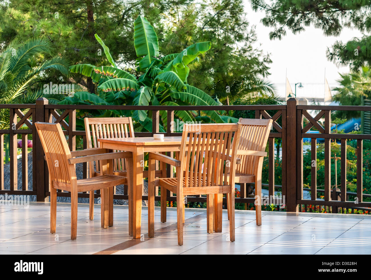 Table setting on a terraced lounge at a Mediterranean resort hotel ...