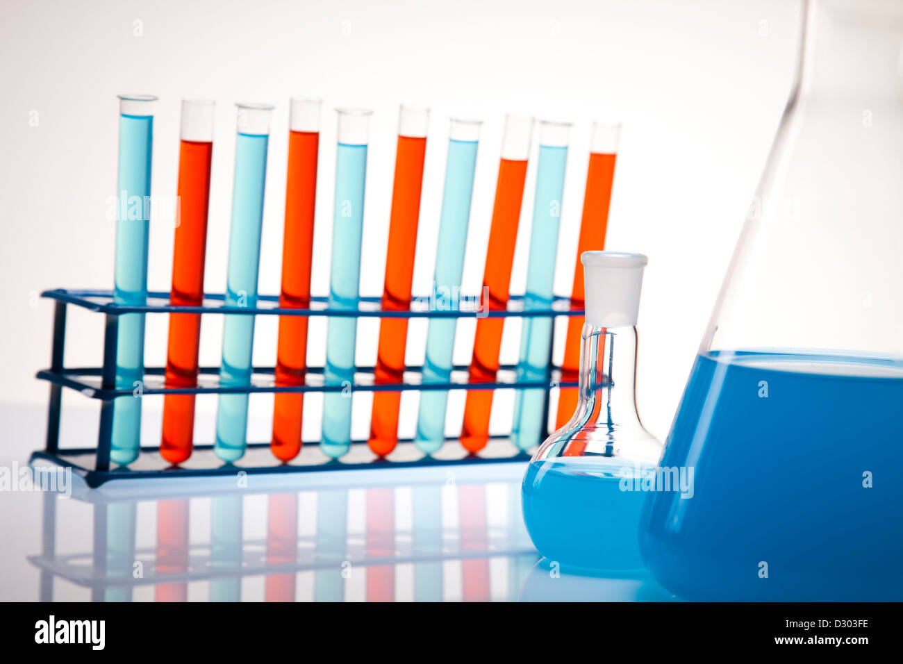 Laboratory flasks with fluids of different colors Stock Photo - Alamy