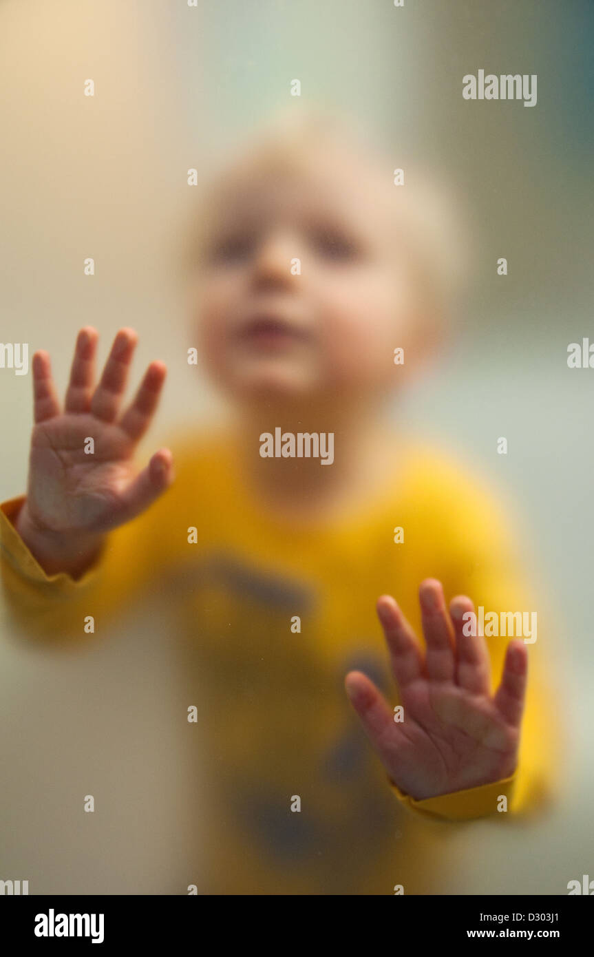 Silhouette of child behind the glass Stock Photo - Alamy