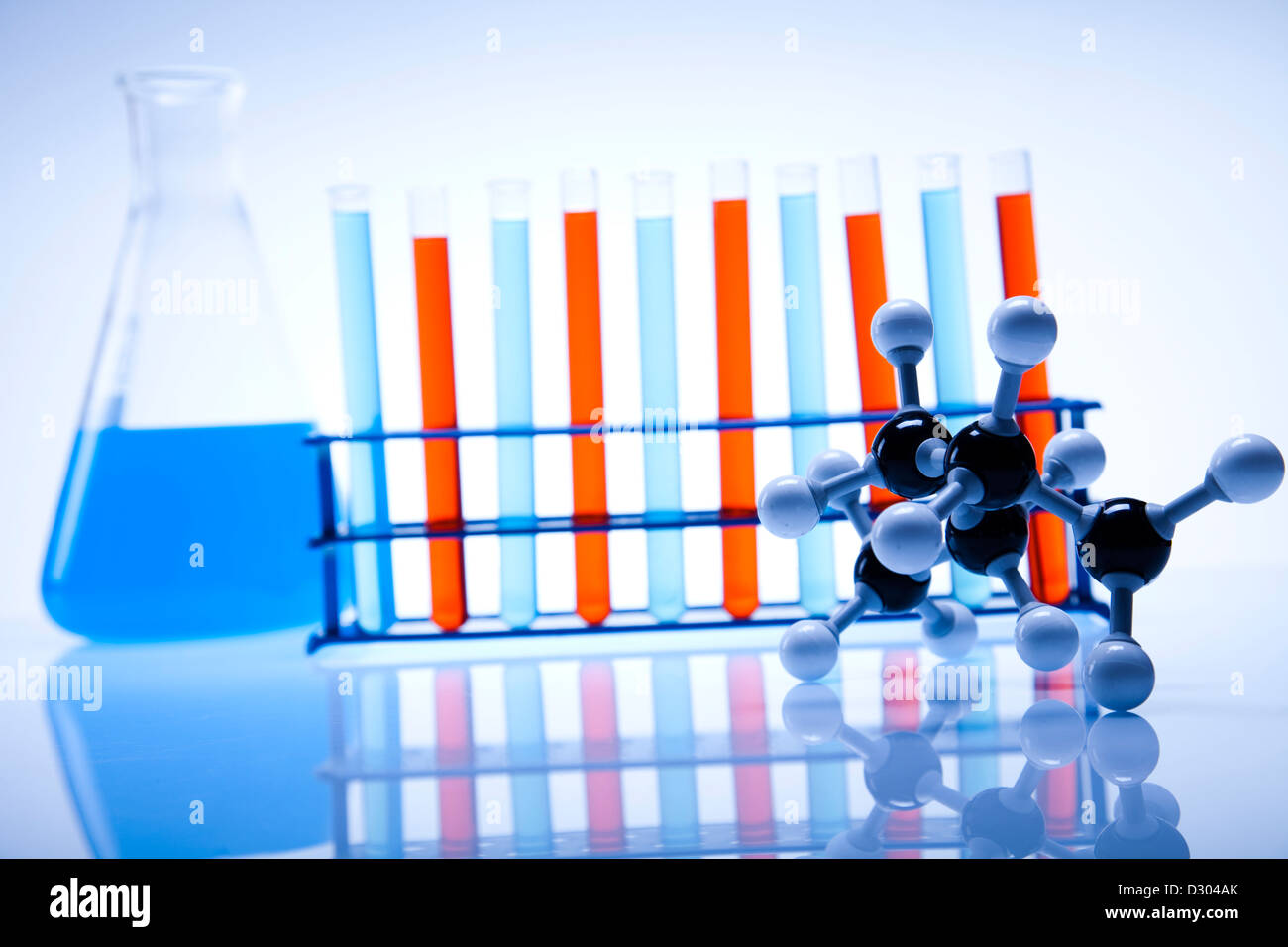 Molecular model and flasks in laboratory Stock Photo - Alamy