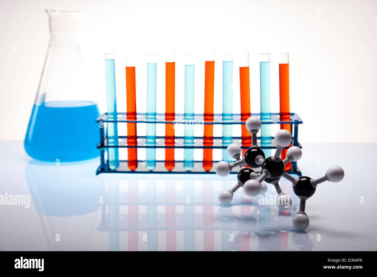 Molecular model and flasks in laboratory Stock Photo - Alamy
