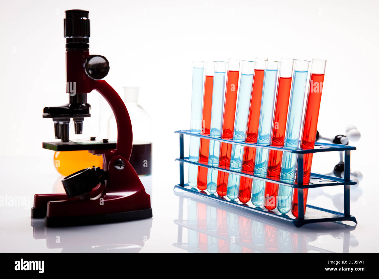 Microscope and atom with Laboratory glass Stock Photo - Alamy