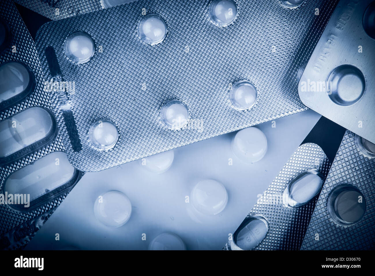 Pills of many shapes and colors grouped together Stock Photo - Alamy