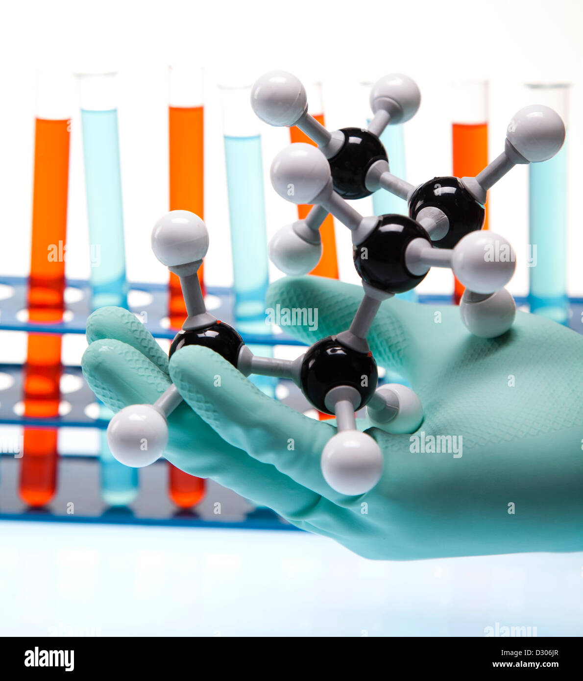 Molecular model and flasks in laboratory Stock Photo - Alamy