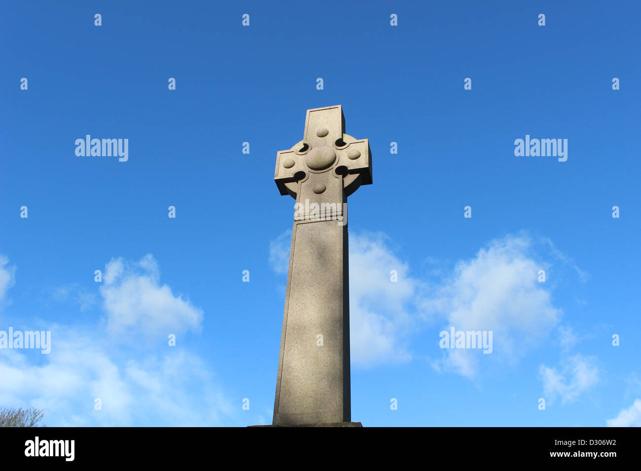 Stone cross on top of a monument Stock Photo - Alamy