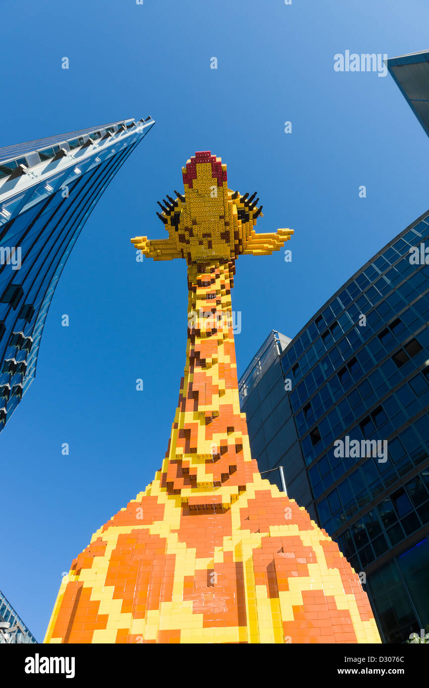 A figure of a giraffe in front of LEGO in the Legoland Discovery Centre ...