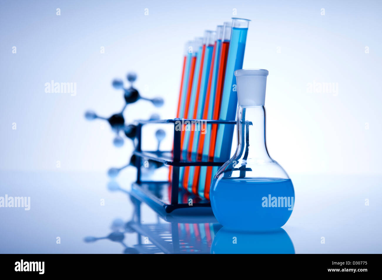 Molecular model and flasks in laboratory Stock Photo - Alamy