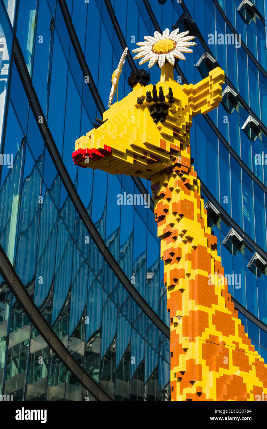 A figure of a giraffe in front of LEGO in the Legoland Discovery Centre ...