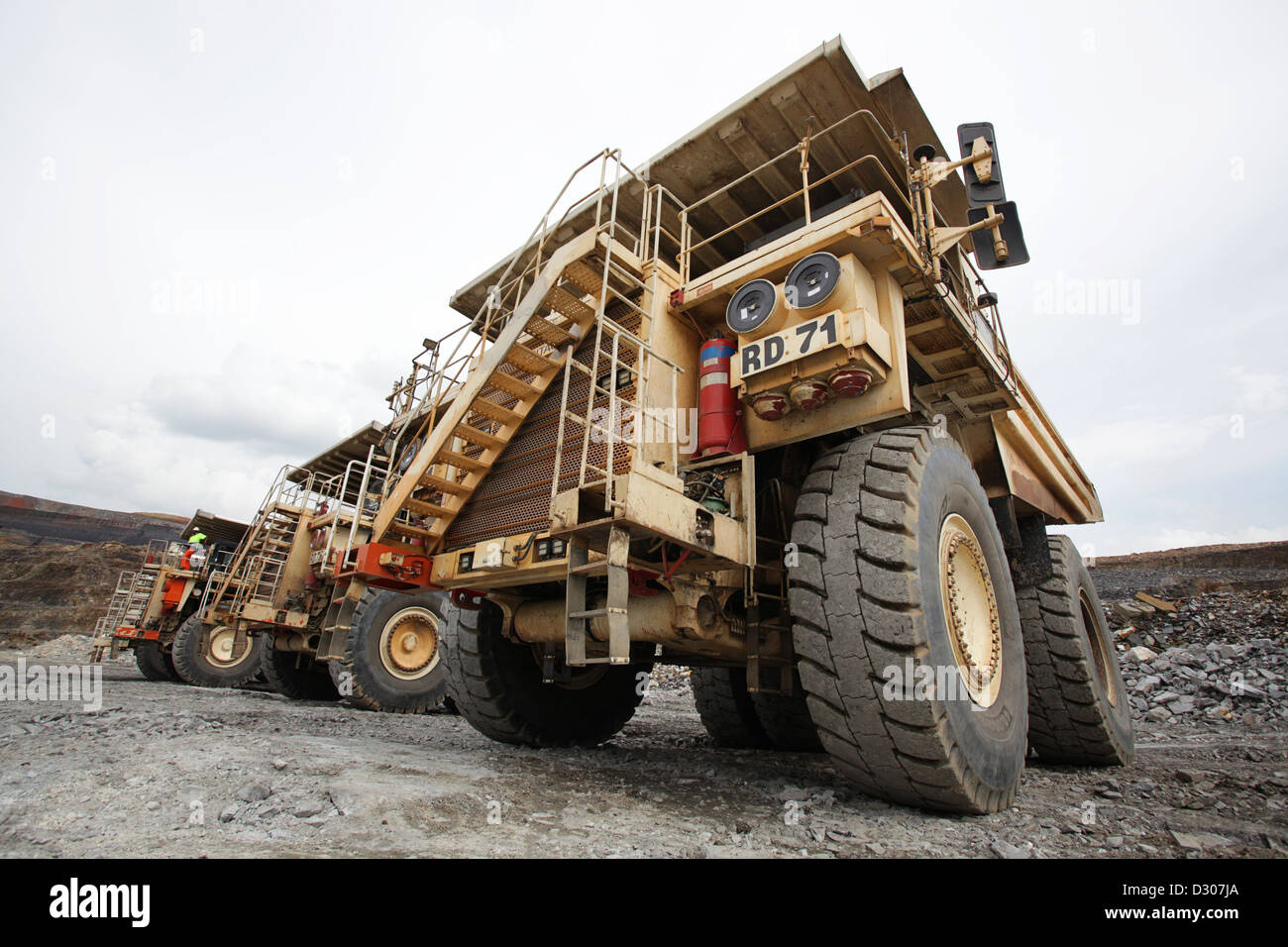 3 large haul Hitachi trucks belonging to FQML First Quantum Stock Photo ...