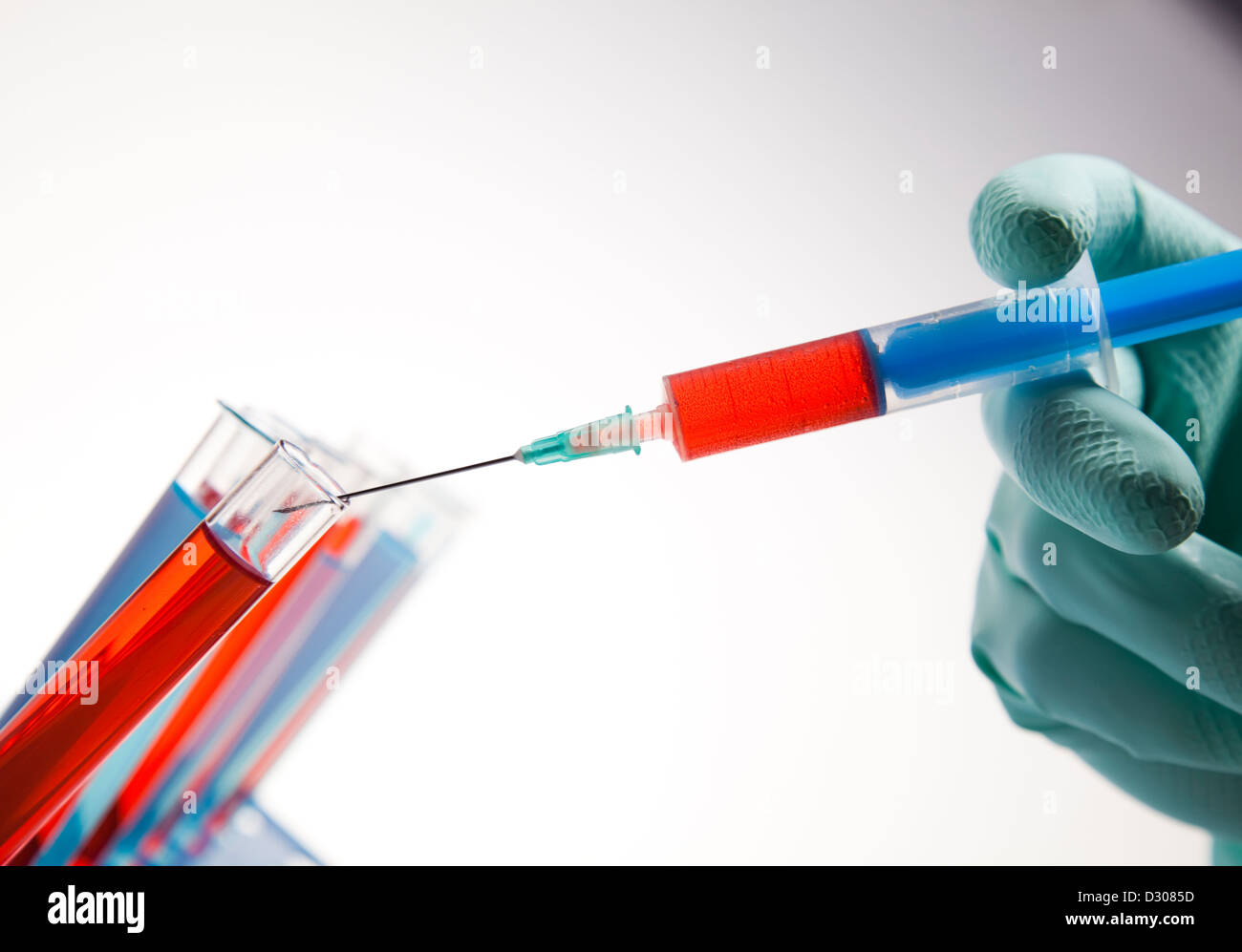 Scientist in laboratory examinates samples and chemical fluids Stock ...