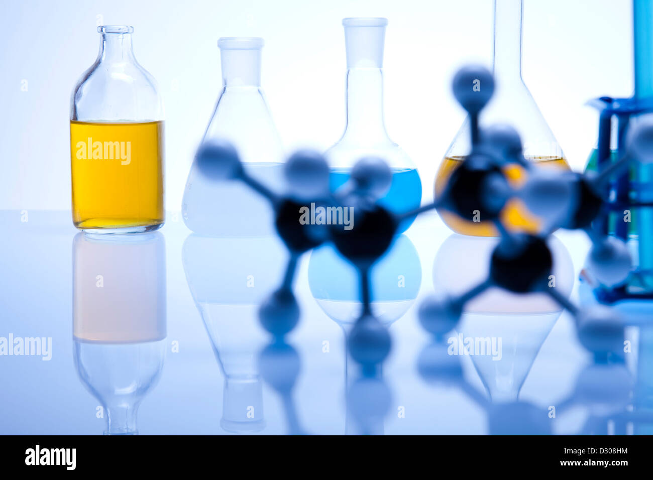 Molecular model and flasks in laboratory Stock Photo - Alamy