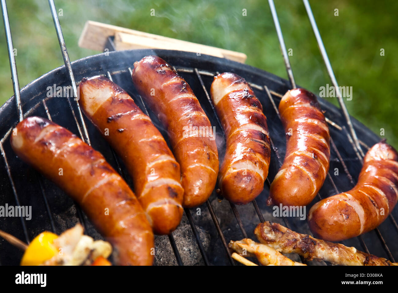 Cooking on the barbecue grill Stock Photo - Alamy