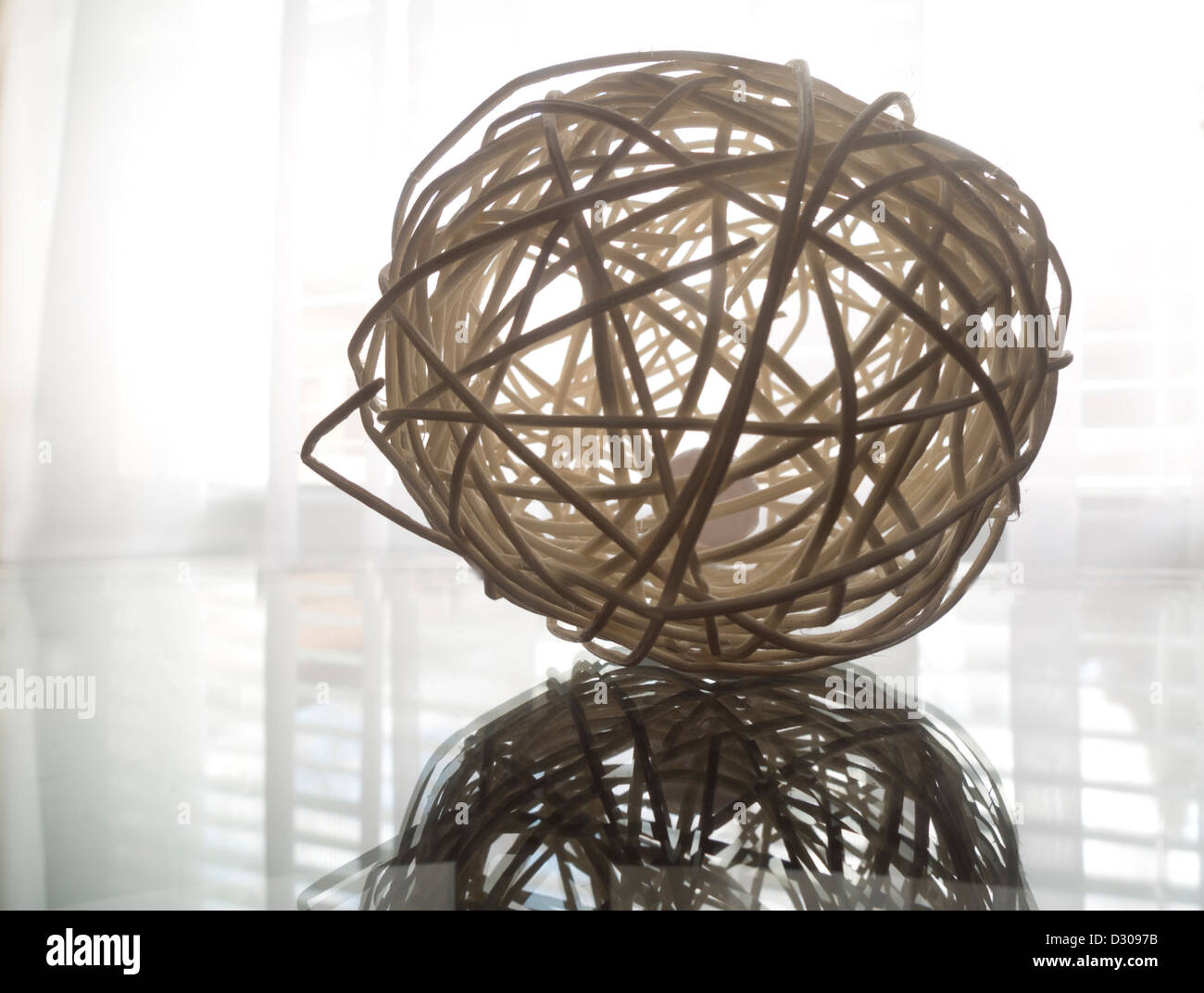 round woven plastic ball on table Stock Photo - Alamy