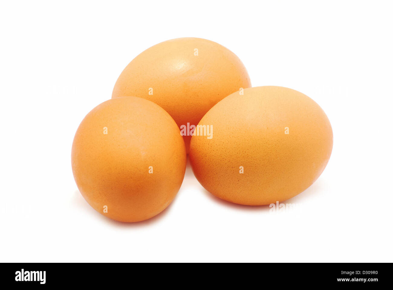 Three eggs isolated on white background Stock Photo - Alamy